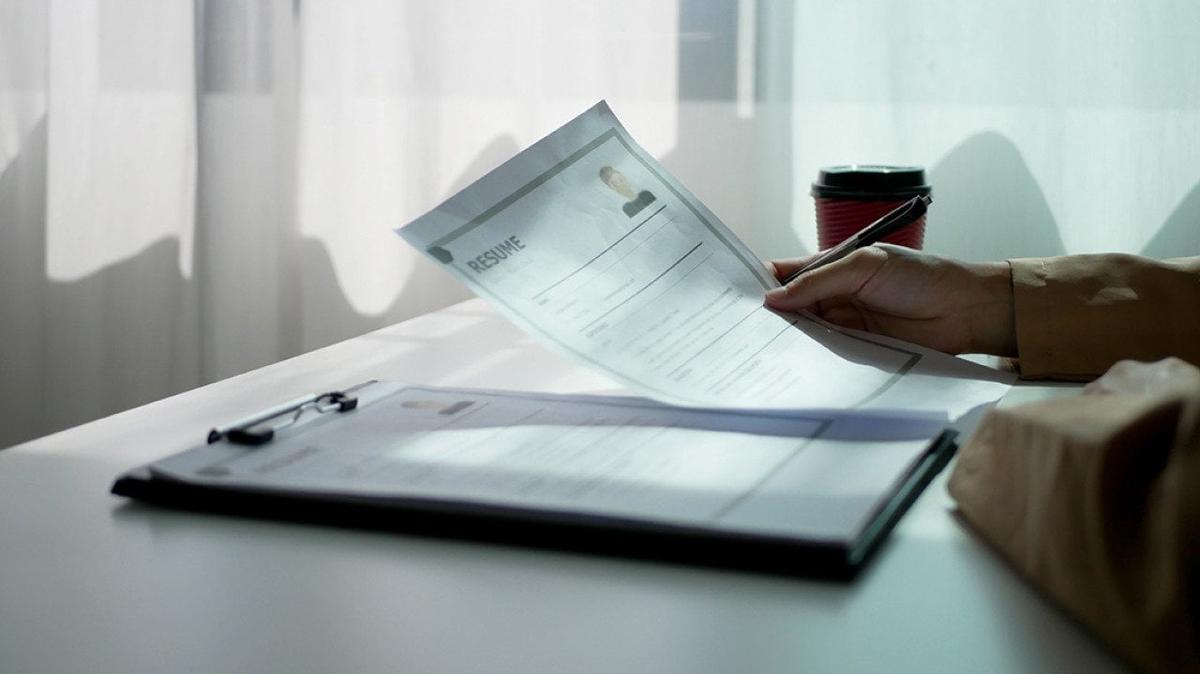 Scammers are using stolen identities to land jobs. Your resume could be ...